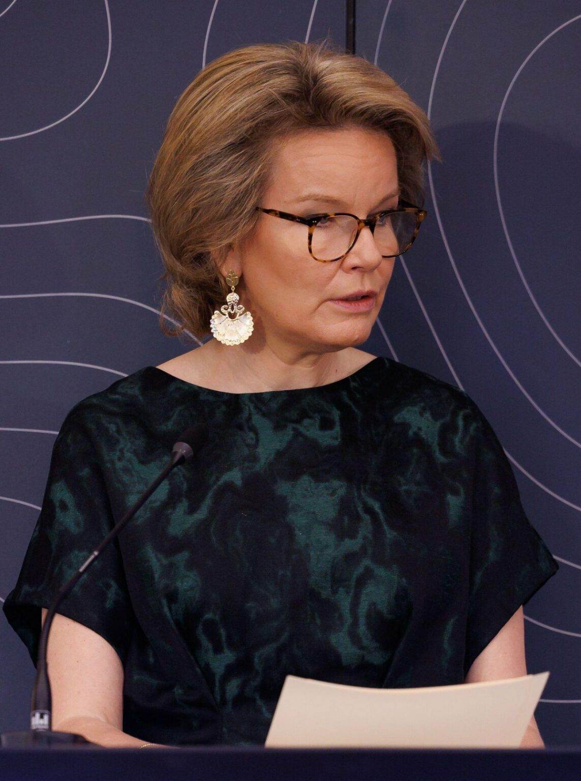 Queen Mathilde’s Elegant Gold Earrings in Tournai